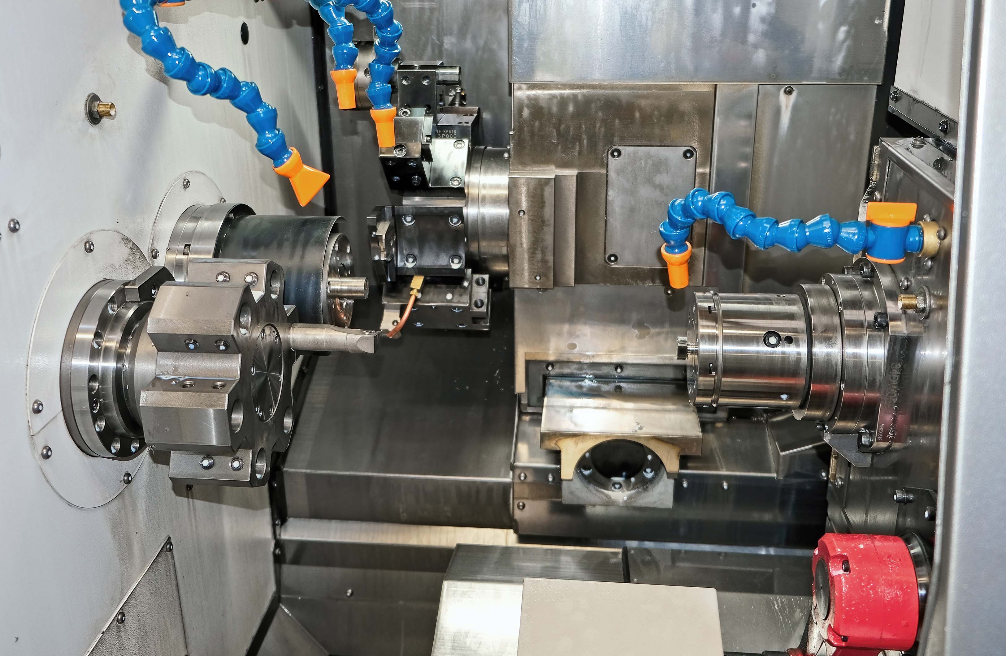 LONGER PRODUCTION RUNS OF TURNED PARTS DICTATE MOVE TO SLIDING-HEAD ...